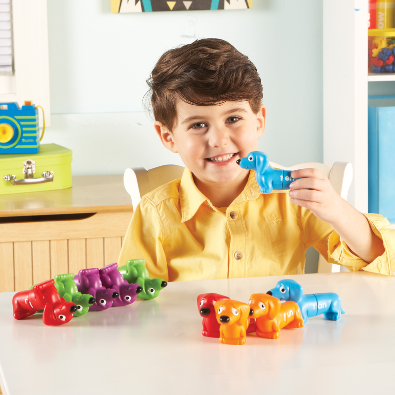 SNAP-N-LEARN RHYMING PUPS Word Builder | Discovery Toys